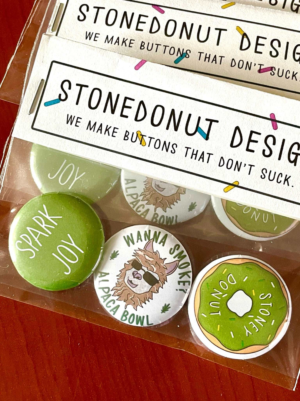 Assorted Pinback Button Designs – Stone Donut Design