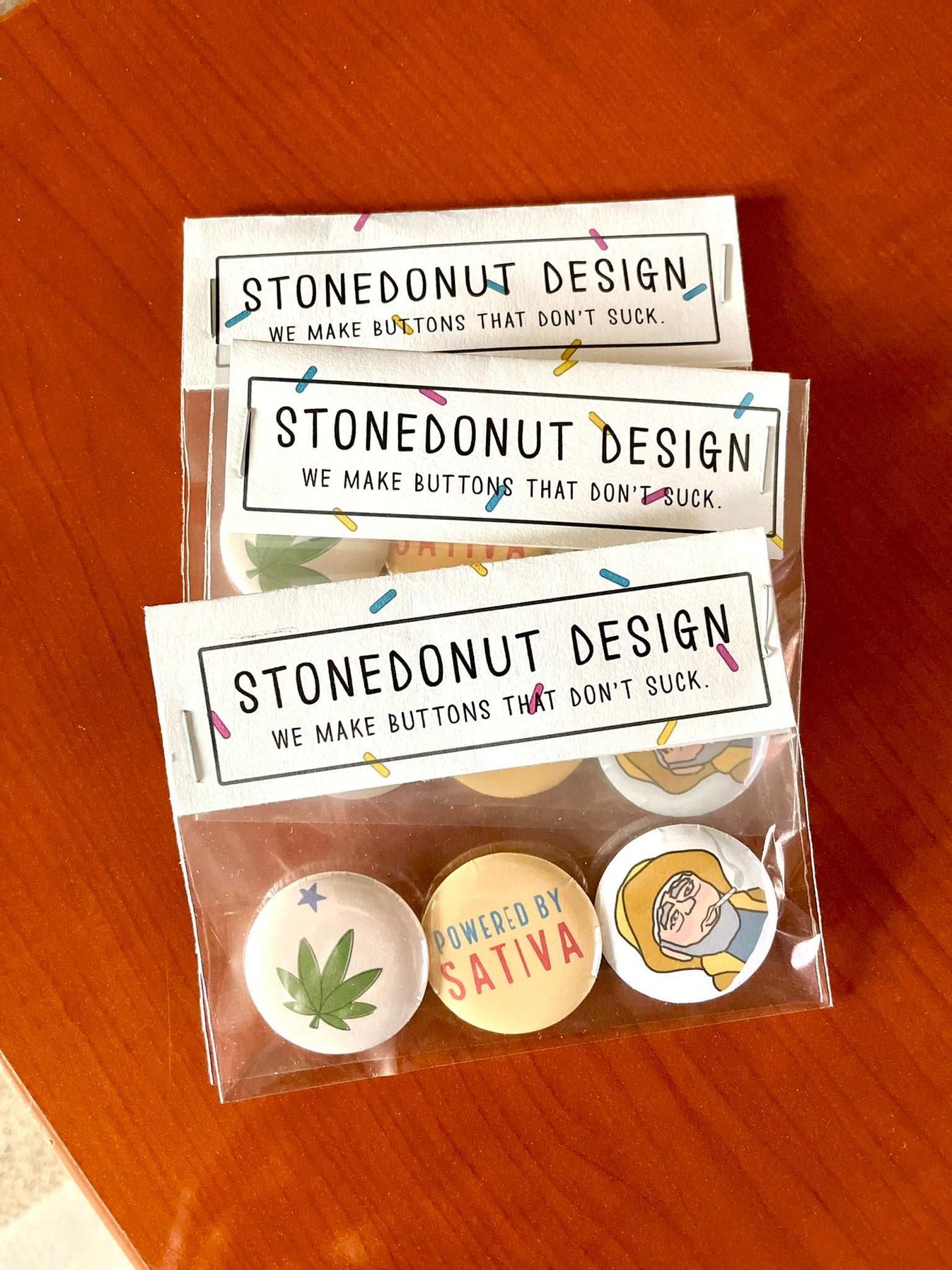 Assorted Pinback Button Designs – Stone Donut Design